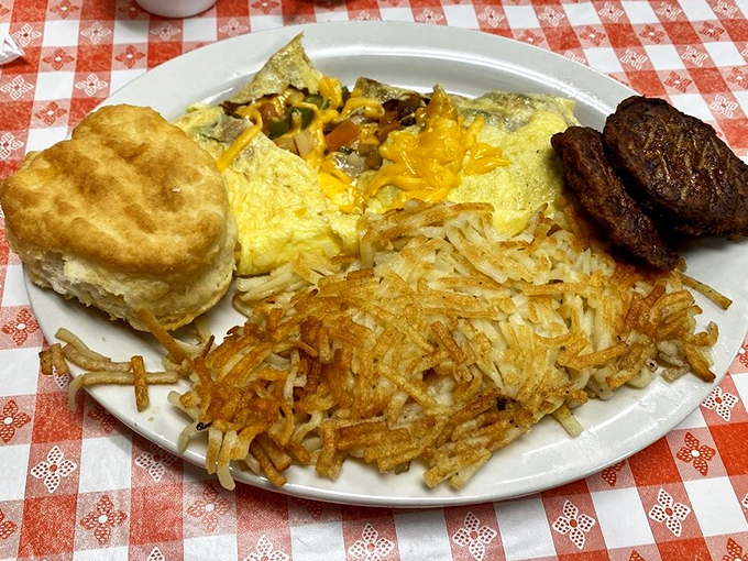 That golden cheese-topped omelet with hash browns so crispy they practically sing when your fork hits them. Breakfast perfection exists!
