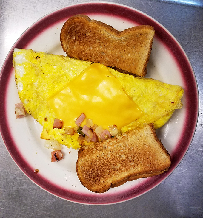 Behold the perfect omelet&mdash;folded like a letter containing the good news that breakfast doesn't need to be complicated to be magnificent.