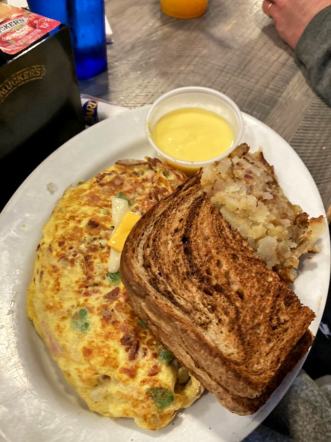 Whoever said "you can't improve on perfection" clearly never met this omelet&mdash;a masterclass in breakfast architecture with just the right cheese-to-veggie ratio. 
