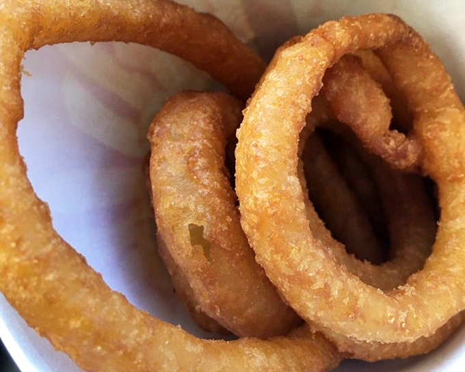 Onion rings with that perfect crunch-to-give ratio&mdash;the kind that make you wonder why anyone bothers with fancy appetizers.