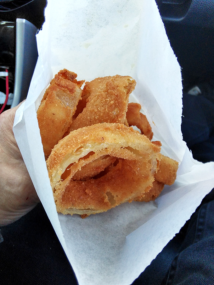 Golden-brown onion rings that shatter with each bite &ndash; the perfect car snack that somehow tastes better when eaten behind a steering wheel.