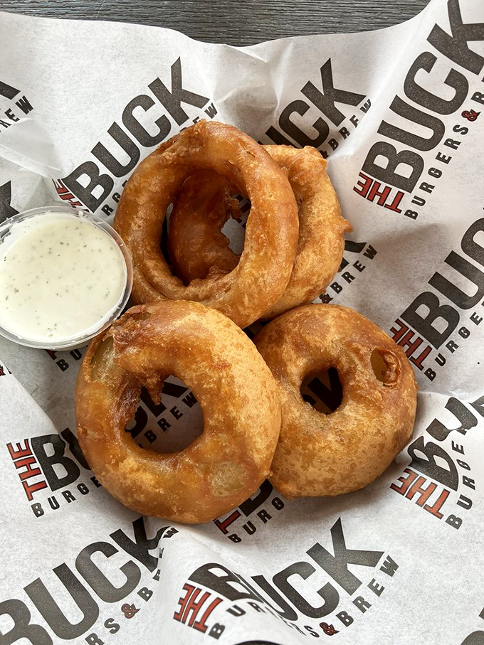 These onion rings aren't just appetizers&mdash;they're golden halos of happiness with a side of heavenly dipping sauce.