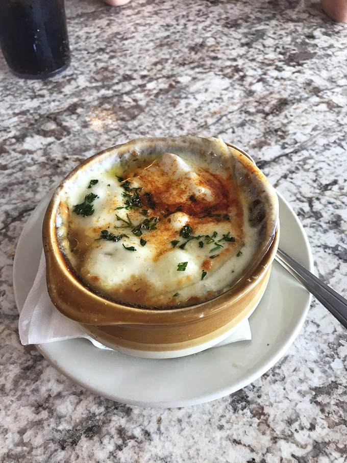 French onion soup that's having its glamour shot moment &ndash; the cheese pull potential here could win Olympic medals if they had such a category.