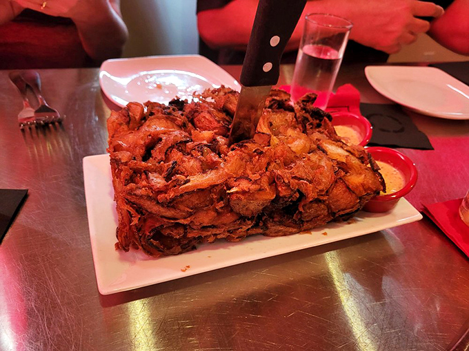 This towering creation isn't just food&mdash;it's architecture with flavor. Like a meaty jenga tower that you're actually encouraged to demolish.