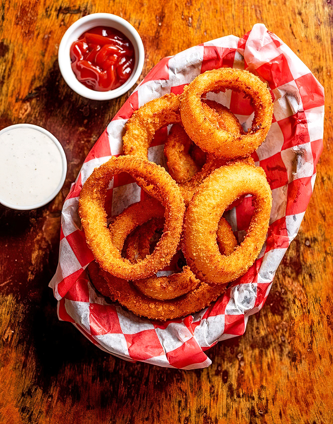 Golden rings of onion perfection that could make even a vegetable skeptic reconsider.