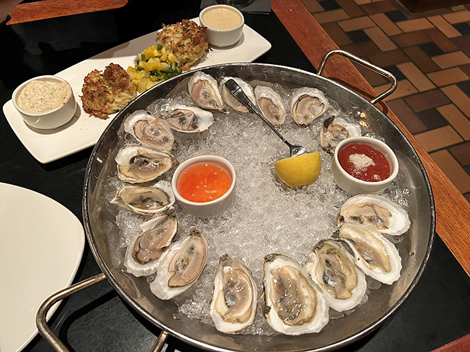 These oysters aren't just served&mdash;they're presented like jewelry on ice, surrounded by their perfect companions: tangy cocktail sauce and zesty mignonette.