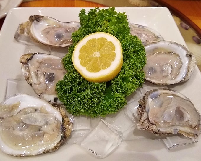 Fresh oysters on the half shell&mdash;ocean jewels arranged like a briny treasure chest, with that lemon crown adding just the right citrus punch.