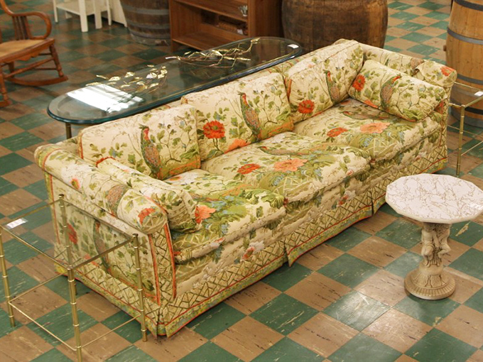 That floral sofa has stories to tell! Imagine the dinner parties, heart-to-hearts, and "I Love Lucy" episodes it witnessed in its previous life.