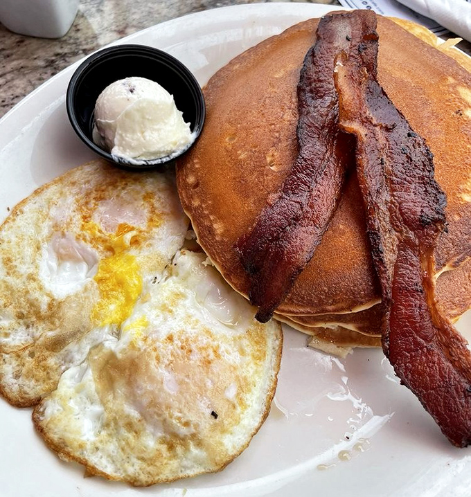 The pancake combo that launched a thousand return visits &ndash; golden discs of perfection with eggs and bacon that would make Ron Swanson weep with joy.
