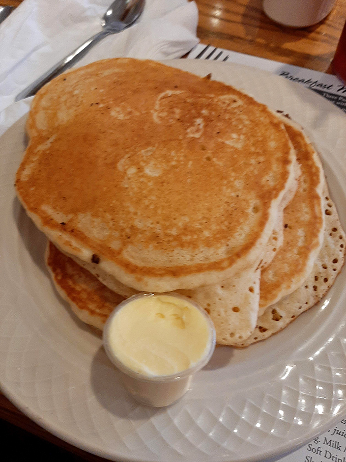 Golden pancakes stacked high with a side of butter—the breakfast equivalent of a warm hug on a cold Ohio morning.