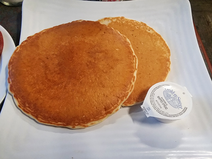 These golden pancakes aren't just breakfast&mdash;they're edible sunshine, perfectly sized to cover the plate and your morning hunger pangs.