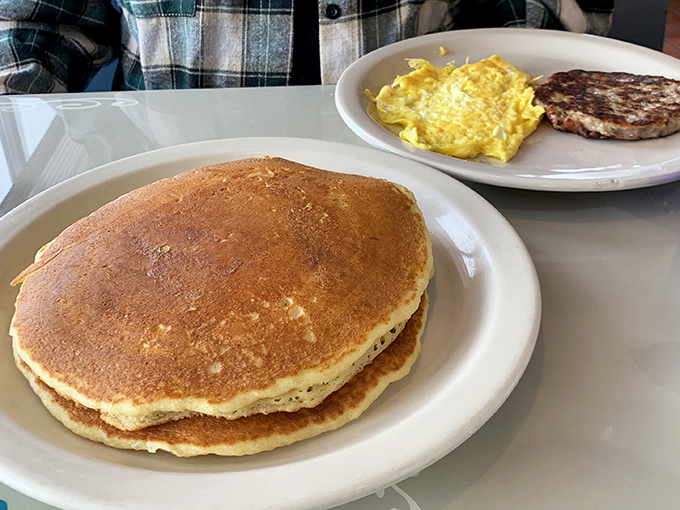 Pancakes so perfectly golden they deserve their own medal ceremony &ndash; fluffy enough to use as a pillow if you weren't so busy devouring them.