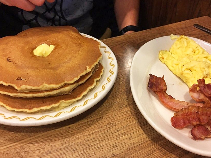 Pancakes so perfectly golden they deserve their own Instagram account. Paired with eggs and bacon, it's the breakfast trinity that never disappoints.