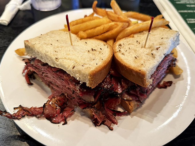 This pastrami sandwich isn't just lunch; it's a religious experience. The meat-to-bread ratio would make any New Yorker shed a tear of joy.