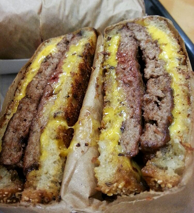 The patty melt in its natural habitat &ndash; where bread meets beef in a marriage blessed by cheese and sealed with a kiss of the grill.