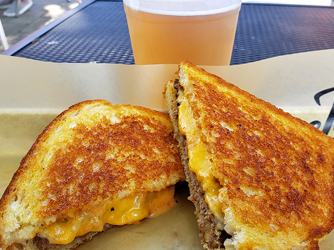 The patty melt that launched a thousand cravings&mdash;golden-brown sourdough embracing melted cheese and beef in perfect harmony. A sandwich worth writing home about.