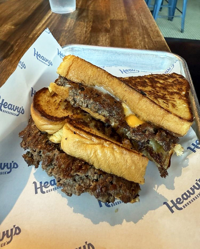 The patty melt at Heavy's doesn't just blur the line between burger and sandwich&mdash;it obliterates it in a glorious fusion of beef and toasted bread.