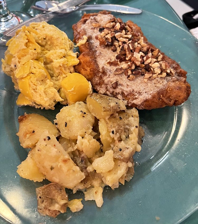 Southern comfort reimagined&mdash;crispy chicken alongside buttery potatoes that would make your grandmother both jealous and proud.