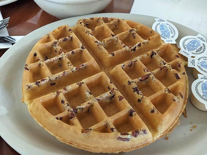 This pecan waffle doesn't need Instagram filters - crisp exterior, fluffy interior, and pecans baked right into the batter for that perfect crunch.