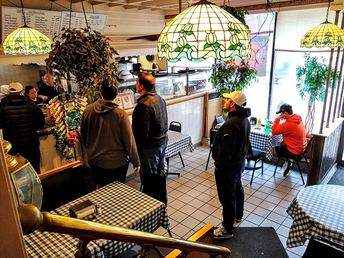 The lunch rush at Mama's &ndash; where strangers become temporary friends united by the universal language of "I can't believe how big these sandwiches are."