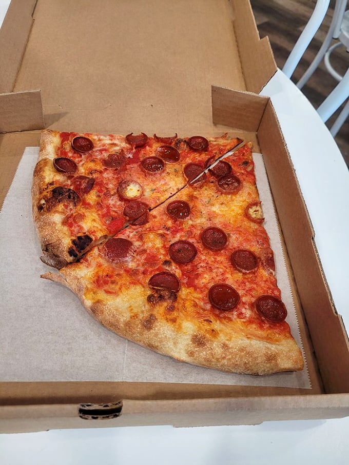 Pepperoni that cups and crisps at the edges, creating little pools of flavor. This is the pizza equivalent of hitting the jackpot on your first pull.