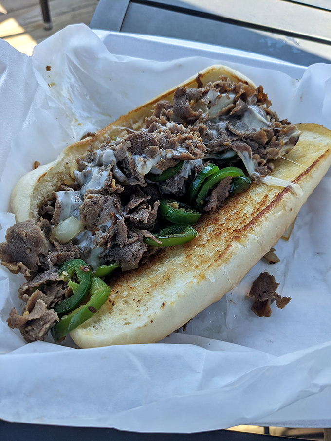 The Philly cheesesteak that makes actual Philadelphians question their hometown loyalty &ndash; meat mountain meets cheese avalanche.