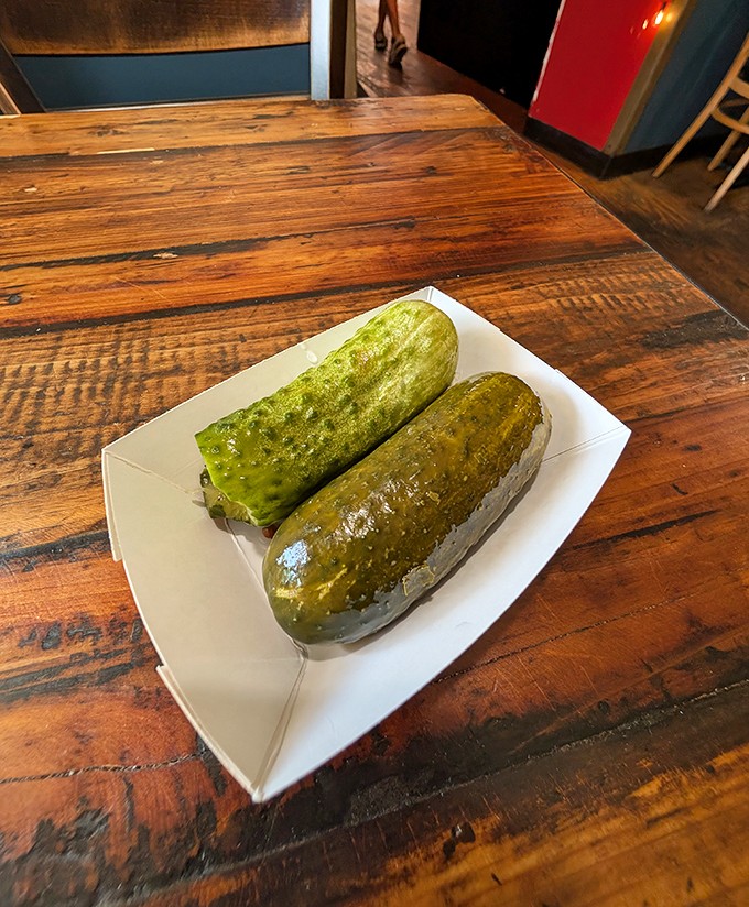 These aren't just pickles—they're crunchy ambassadors of tang that have achieved PhD-level brininess and, miraculously, come complimentary with your meal.