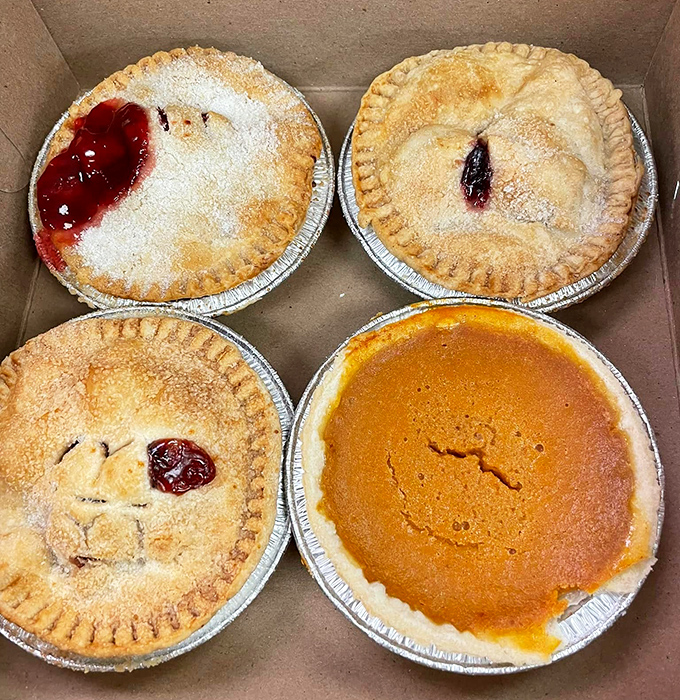 The pie display looks like what would happen if Norman Rockwell decided to paint pure temptation.