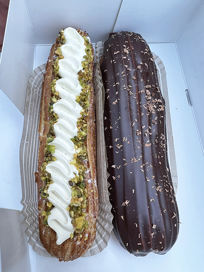 The pistachio &eacute;clair looks like it should have its own Instagram account, while its chocolate companion waits patiently, knowing its turn for the spotlight is coming.