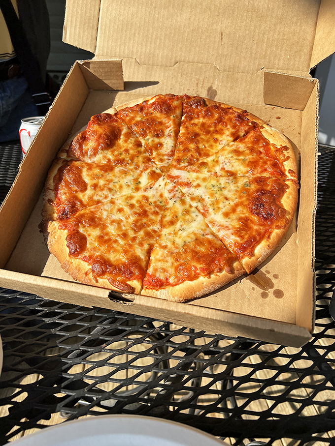 Pizza perfection doesn't need fancy toppings or artisanal nonsense&mdash;just the right cheese-to-sauce ratio and a box that says "I'm taking you somewhere special."