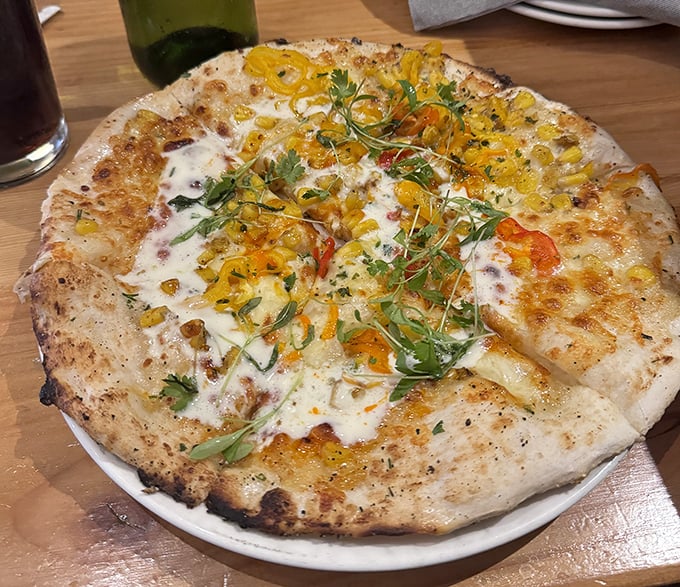 This isn't just pizza&mdash;it's a wood-fired canvas where local ingredients perform a beautiful dance of flavor and texture.