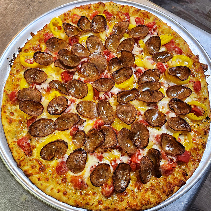 Pizza perfection achieved! Golden cheese, perfectly crisped pepperoni, and vibrant peppers prove that rural Ohio knows its way around a pizza oven.