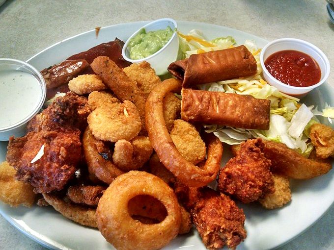 The appetizer combo isn't just a plate&mdash;it's a carnival of fried delights that makes your inner child high-five your grown-up taste buds.