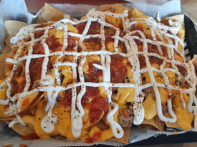 These aren't your average nachos &ndash; they're a smoky, cheesy masterpiece that redefines comfort food completely.