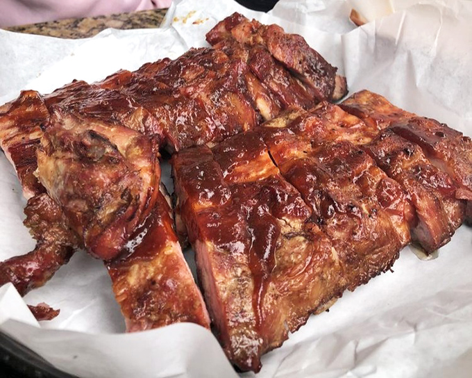 These ribs don't just fall off the bone&mdash;they practically leap into your mouth. Glistening with sauce and packed with smoky flavor, resistance is futile.