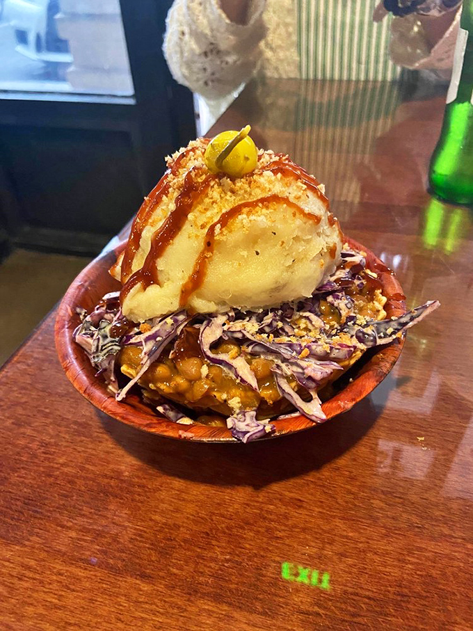 When pulled pork meets creative presentation, magic happens on red-checkered paper that feels like home.