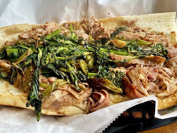 Roasted pork with broccoli rabe&mdash;where savory meat meets bitter greens in a sandwich romance that would make Shakespeare write sonnets about lunch.