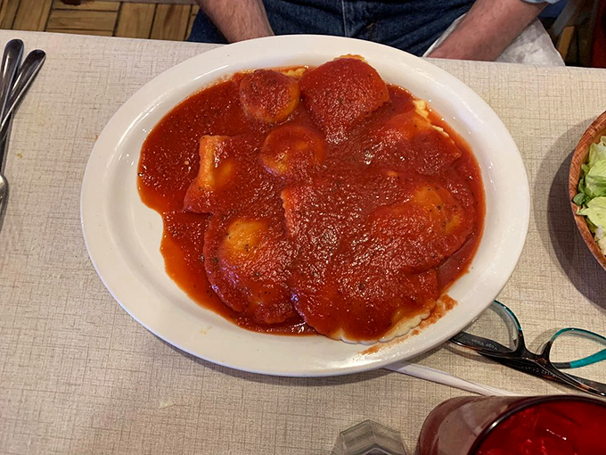 Ravioli swimming in a sea of rich tomato sauce&mdash;each pillow of pasta promising a flavor explosion that would make any Italian grandmother nod in approval.
