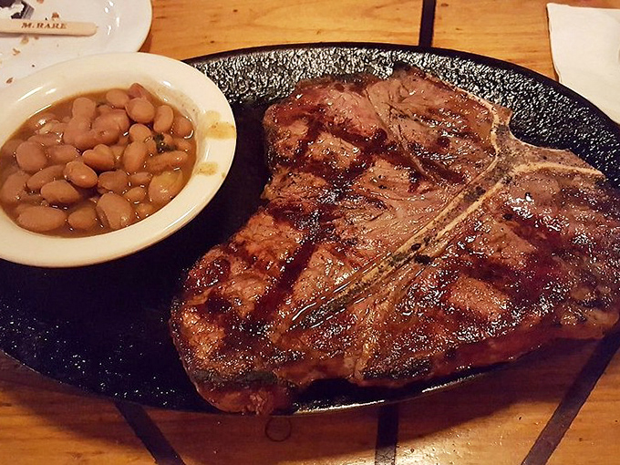 Grill marks aren't just decoration &ndash; they're the autograph of a chef who knows exactly what they're doing. This T-bone speaks the universal language of delicious.