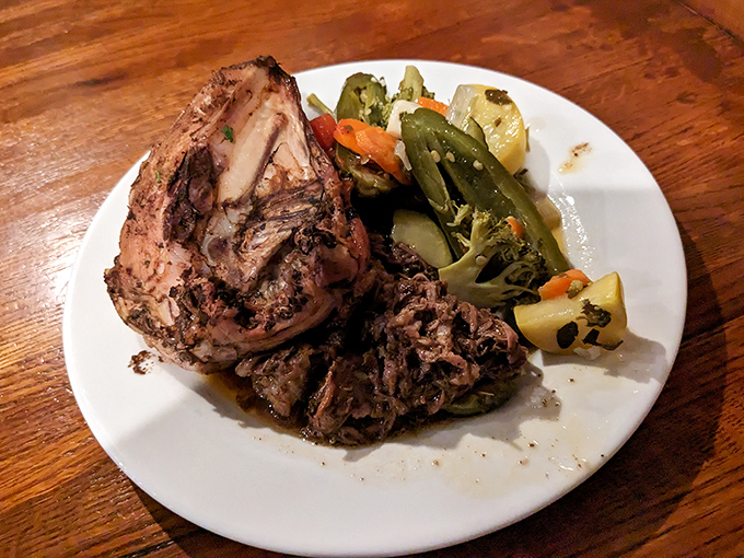 This isn't just pot roast; it's a tender testament to slow-cooking that falls apart at the mere suggestion of your fork.