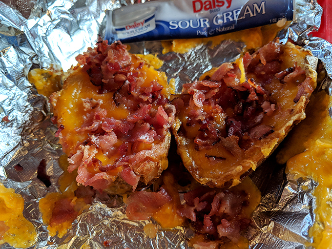 Loaded potato skins that laugh in the face of modern small plates. When bacon and cheese join forces, resistance is deliciously futile.