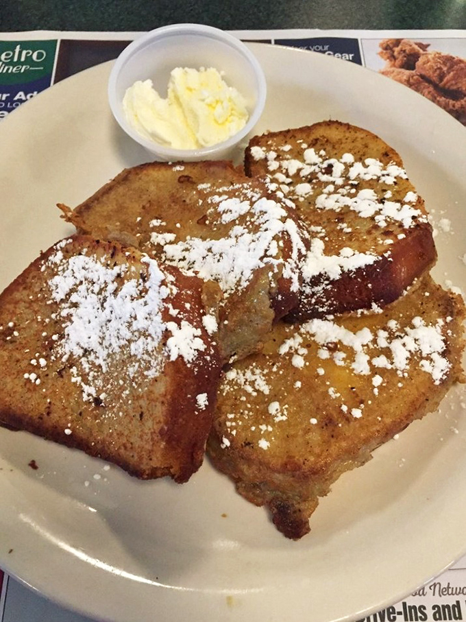 French toast that looks like it's been dipped in sunshine and dusted with powdered sugar snow. Breakfast or dessert? Yes, please.