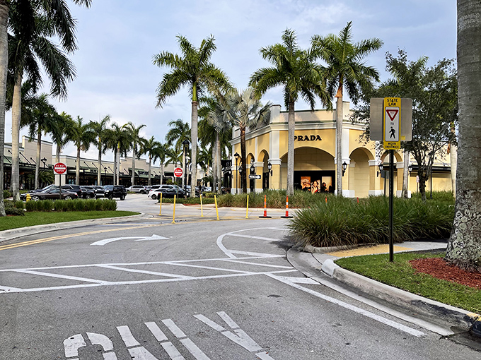 Prada's sunshine-yellow facade is the retail equivalent of a siren song, luring in shoppers with promises of Italian luxury at Florida prices.