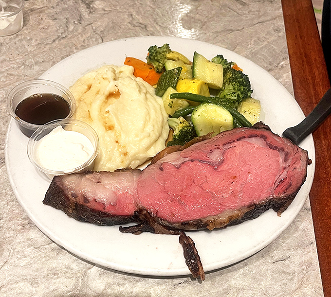 Prime rib cooked to that perfect rosy hue, accompanied by fluffy mashed potatoes and fresh vegetables&mdash;proof that diners can do dinner spectacularly.
