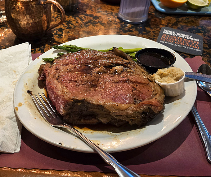 This prime rib isn't just dinner—it's an event. The kind of meal that makes conversation stop and eyes widen, with asparagus standing by for moral support.