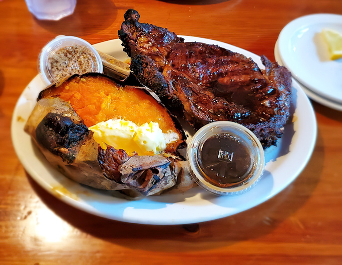 Prime rib so tender it practically falls apart at first glance, accompanied by that perfect baked potato.