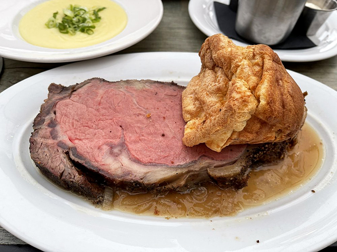 Prime rib so tender it practically surrenders to your fork, accompanied by a Yorkshire pudding that defies gravity. Sunday dinner perfection.