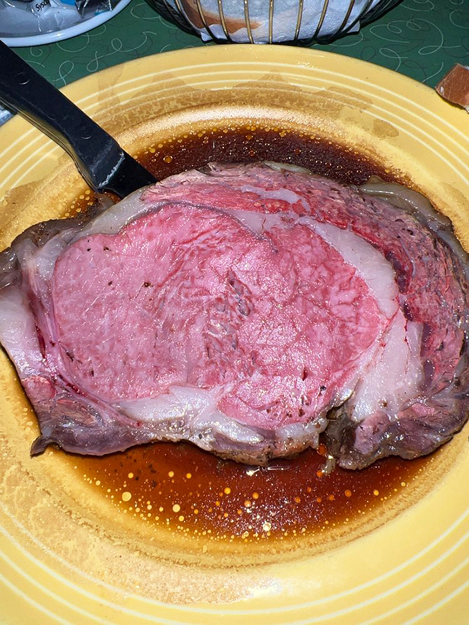 Prime rib so tender it practically falls apart at first glance, accompanied by all the classic fixings.