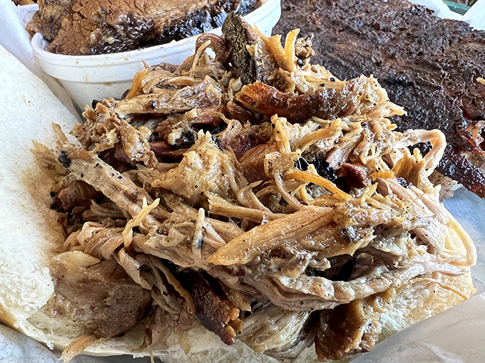 Pulled pork that doesn't need introduction or apology. Tender strands of smoky perfection waiting to transport you to barbecue bliss.