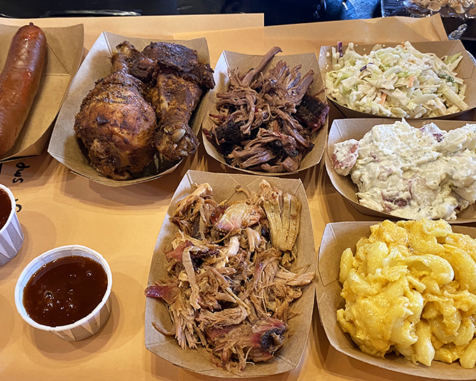 A BBQ spread that would make a vegetarian question their life choices&mdash;chicken, pulled pork, and sides that refuse to be upstaged.